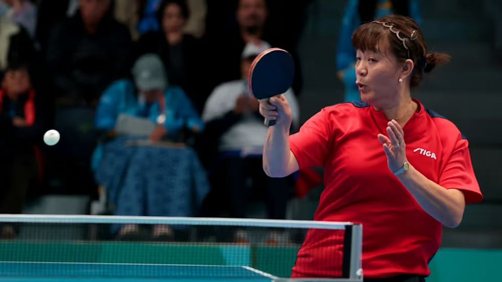 Juegos Olímpicos: a los 58 años, Zhiying Zeng sueña con ganar una ...
